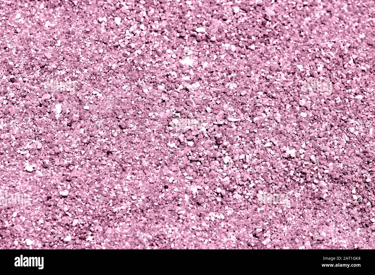 Coastal sand texture close-up. Natural background pink color toned ...