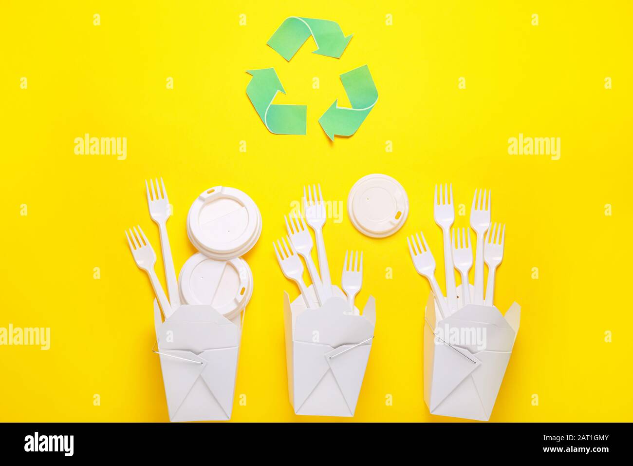 Plastic dinnerware on color background. Recycling concept Stock Photo ...