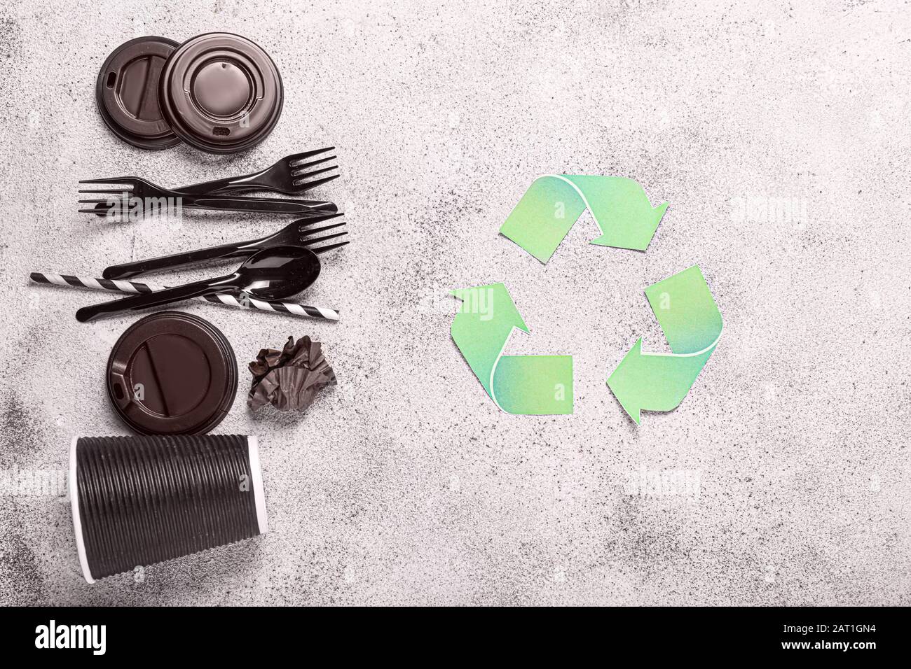 Plastic dinnerware on light background. Recycling concept Stock Photo ...