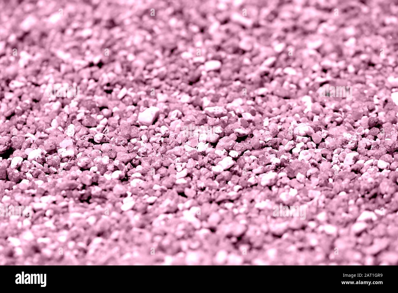 Coastal sand texture close-up. Natural background pink color toned ...