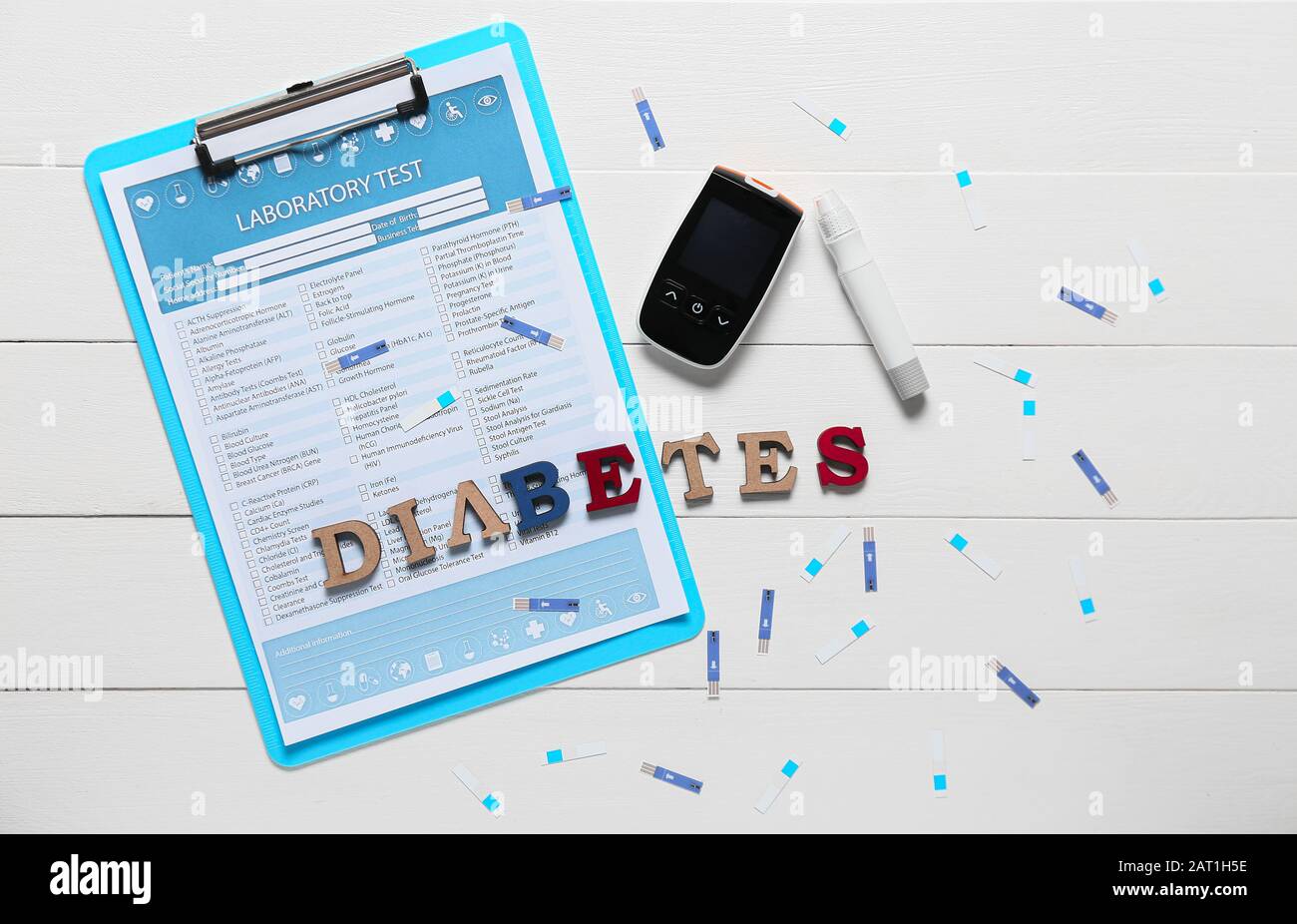 Laboratory test, glucometer and lancet pen on table. Diabetes concept ...