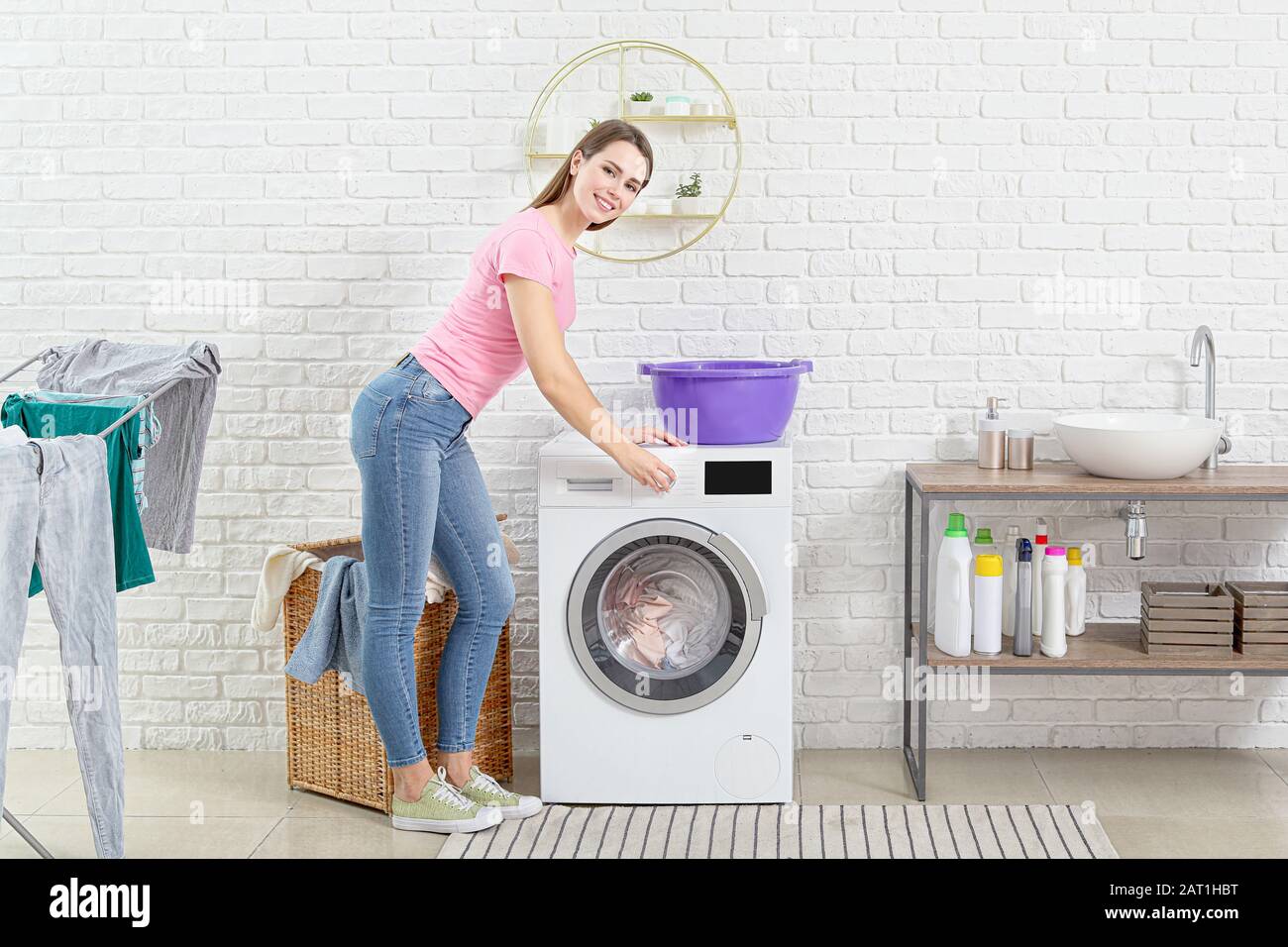 Portrait young housewife washing hi-res stock photography and images ...
