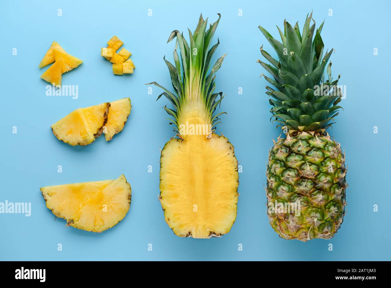 Fresh ripe pineapples on color background Stock Photo - Alamy