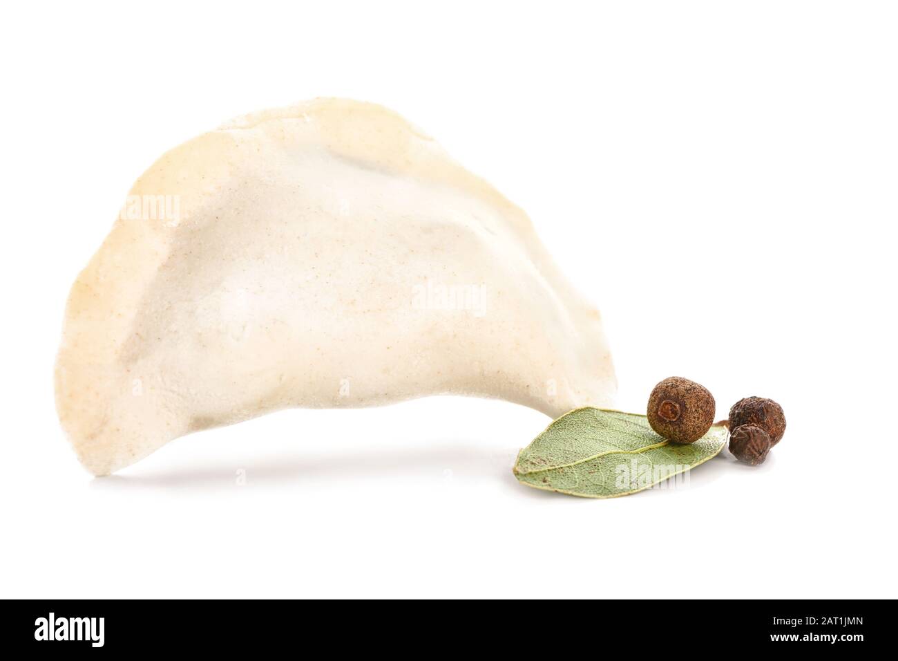 Raw dumpling with spices on white background Stock Photo - Alamy
