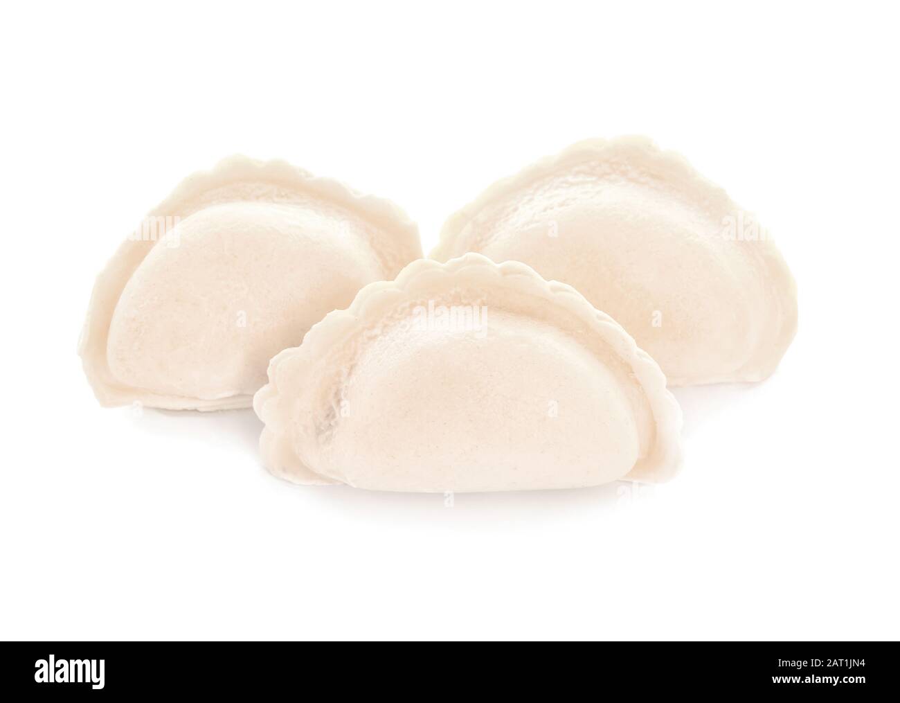 Raw dumplings on white background Stock Photo - Alamy