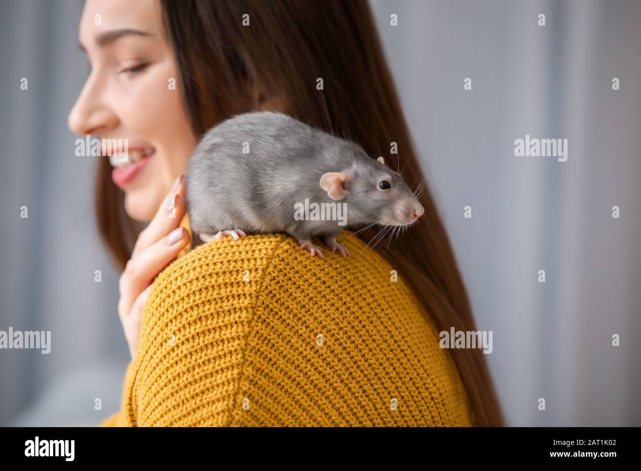 Woman rat shoulder hi-res stock photography and images - Alamy