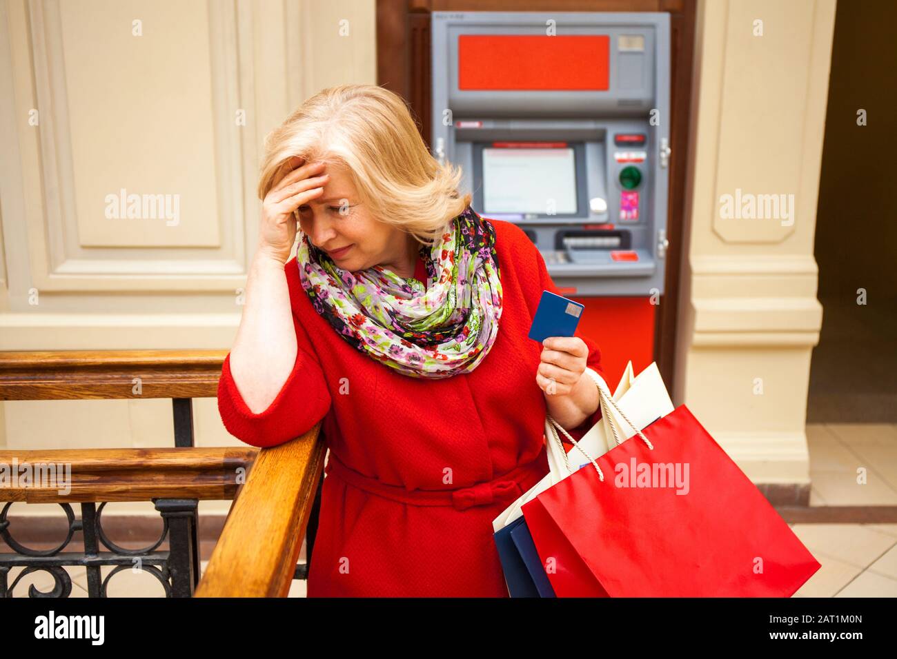 Atm woman sad hi-res stock photography and images - Alamy