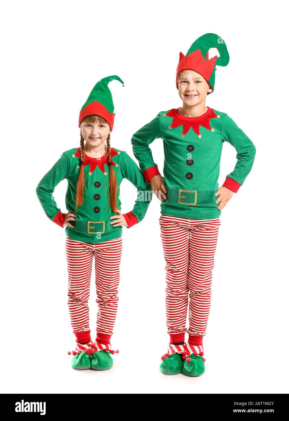 Little children in costume of elf on white background Stock Photo - Alamy