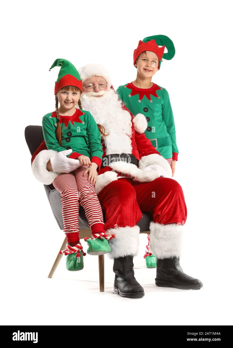 Santa Claus and little elf kids on white background Stock Photo - Alamy