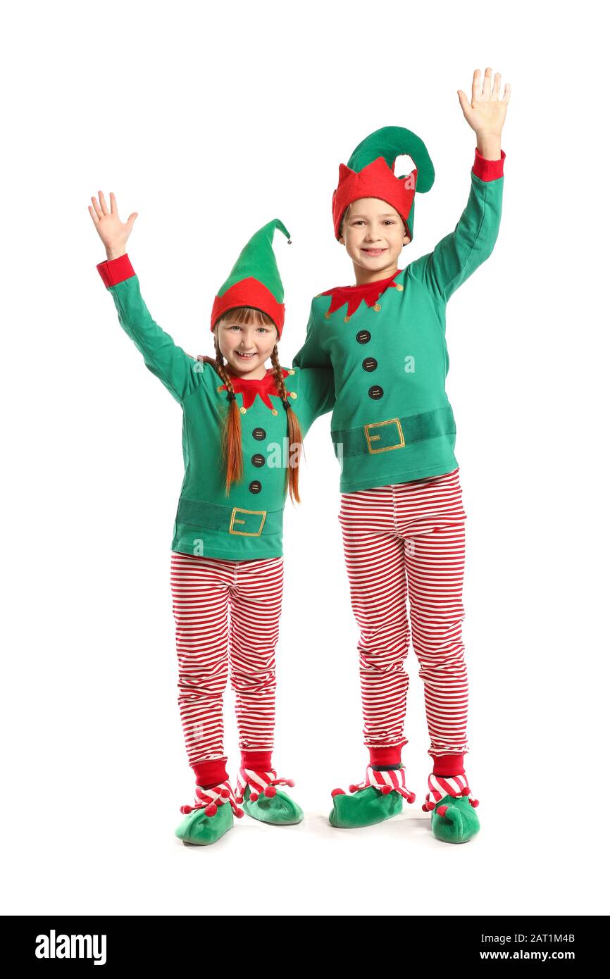Little children in costume of elf on white background Stock Photo - Alamy