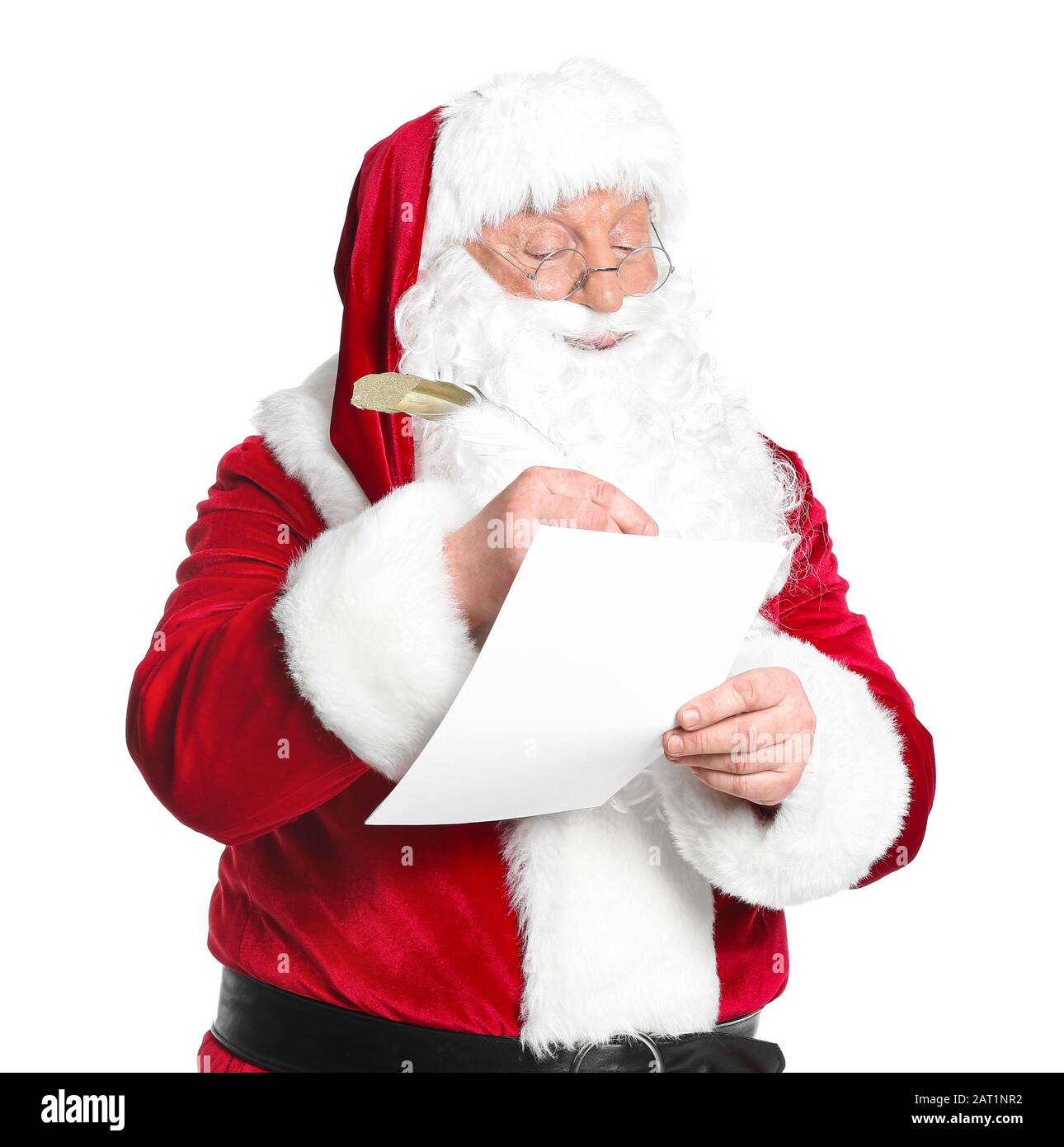 Santa Claus making list of gifts on white background Stock Photo - Alamy