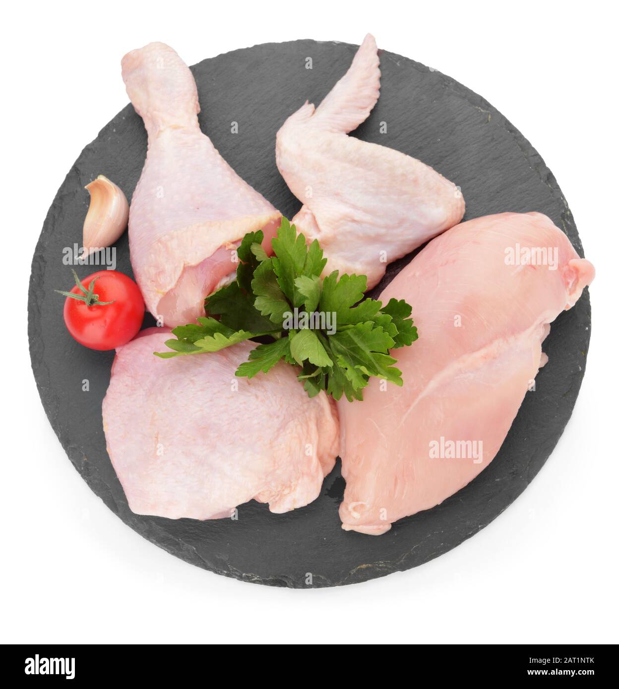Slate plate with raw chicken meat on white background Stock Photo - Alamy