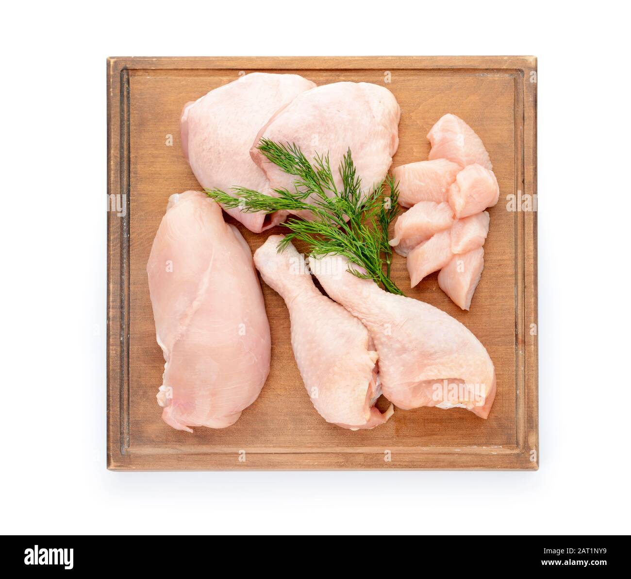 Board with raw chicken meat on white background Stock Photo - Alamy