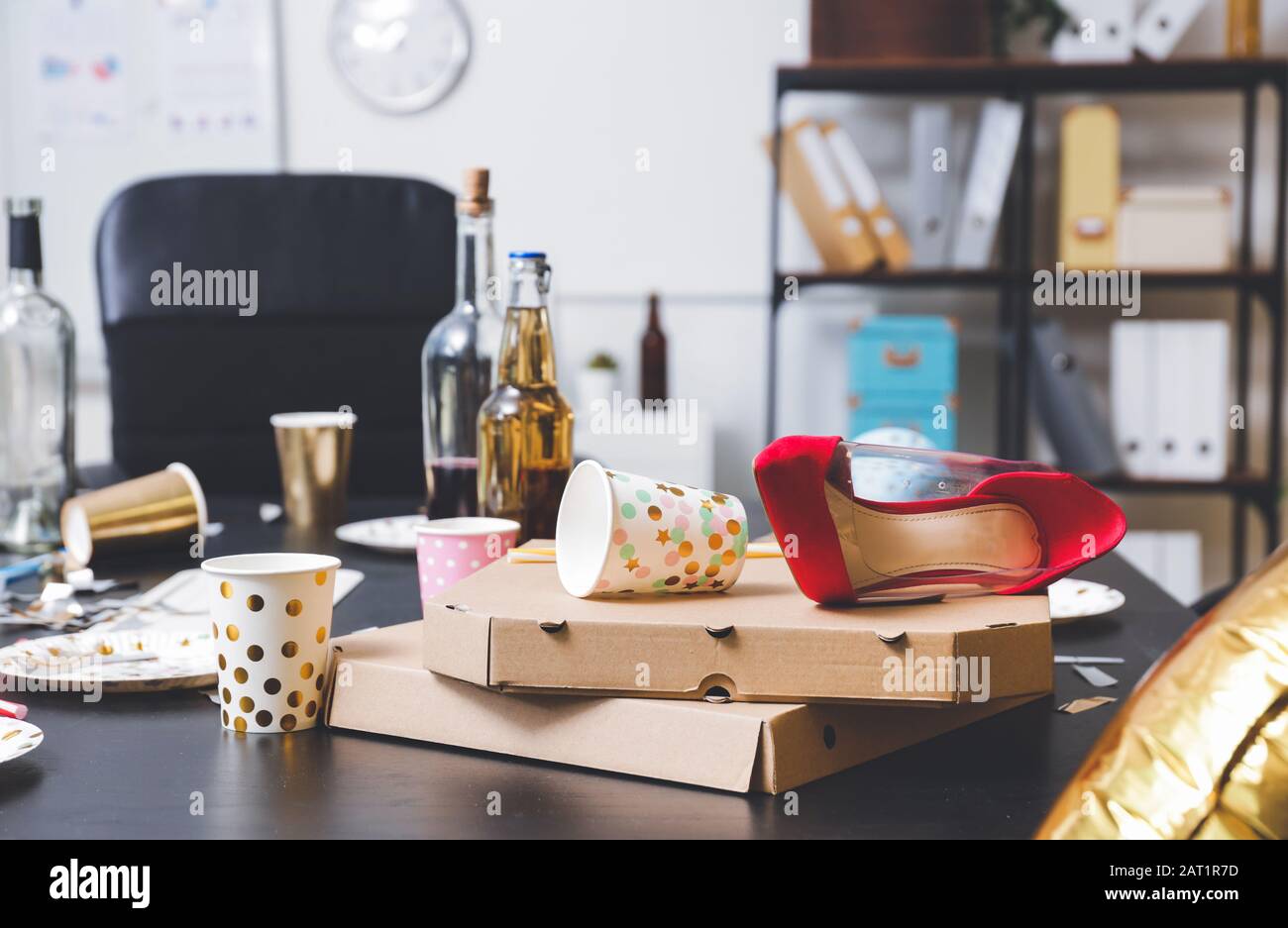 Table with terrible mess in office after New Year party Stock Photo - Alamy