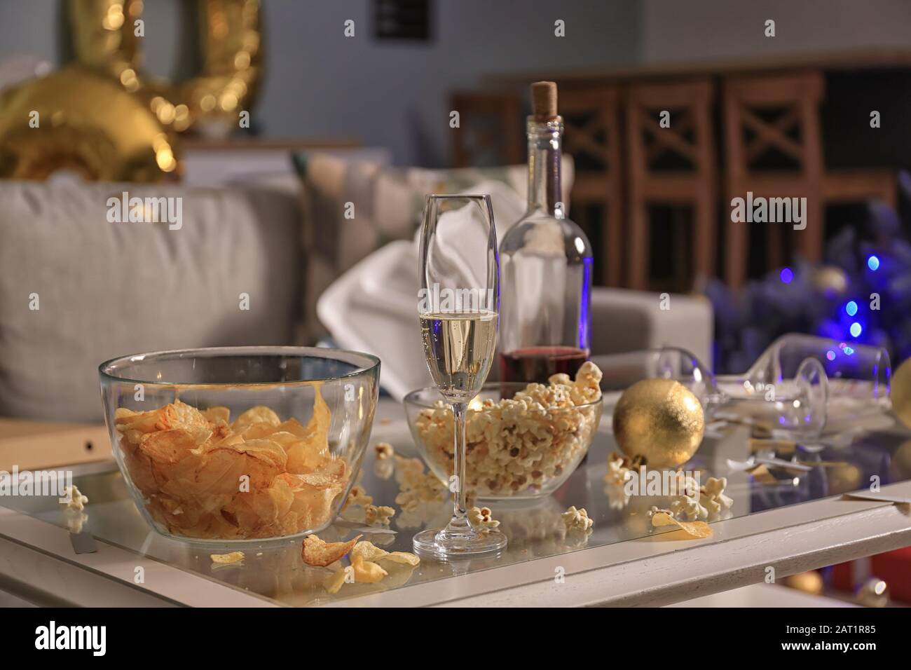 Table with terrible mess in room after New Year party Stock Photo - Alamy