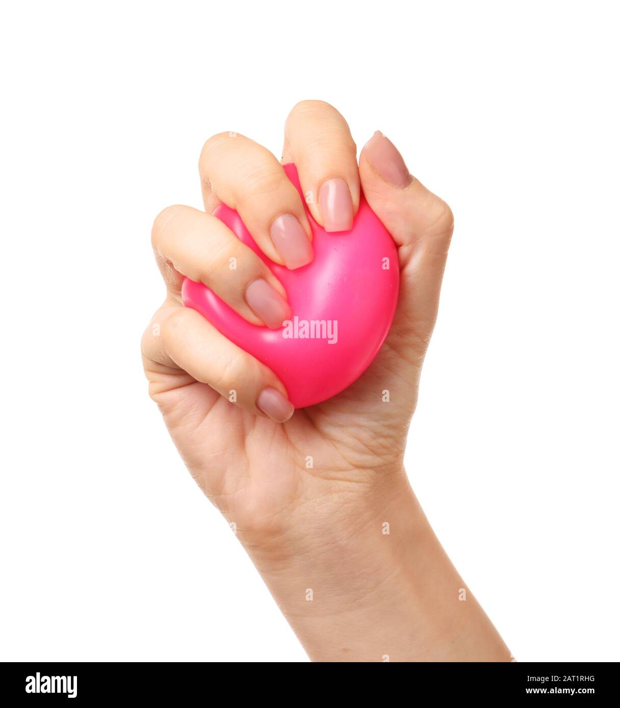Female hand squeezing stress ball on white background Stock Photo - Alamy