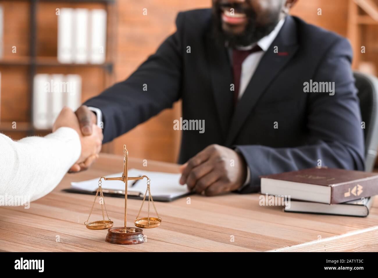 Judge lawyer shaking hands in hi-res stock photography and images - Alamy