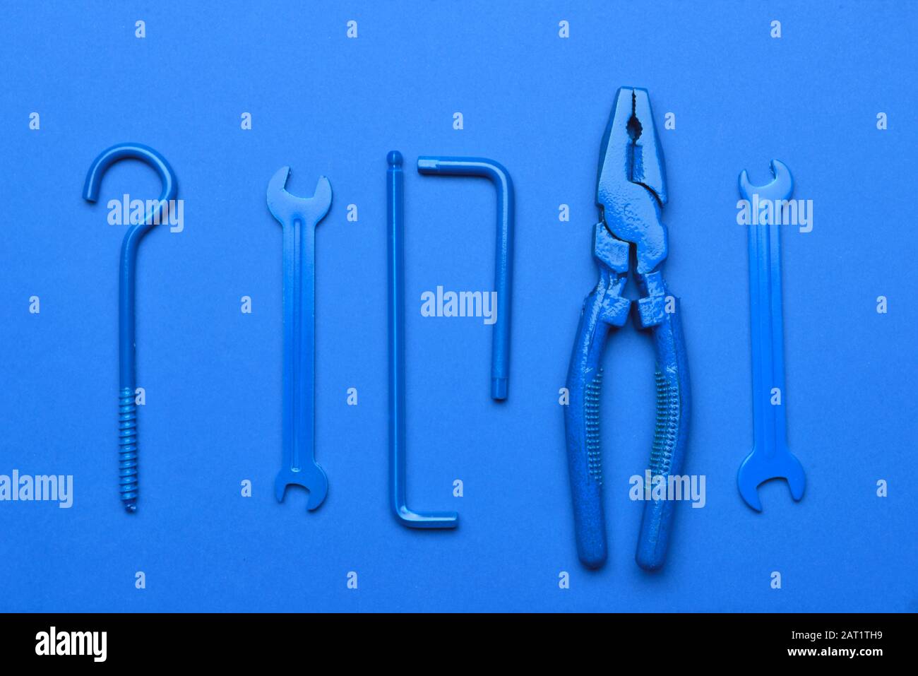 Set of tools on blue background Stock Photo - Alamy