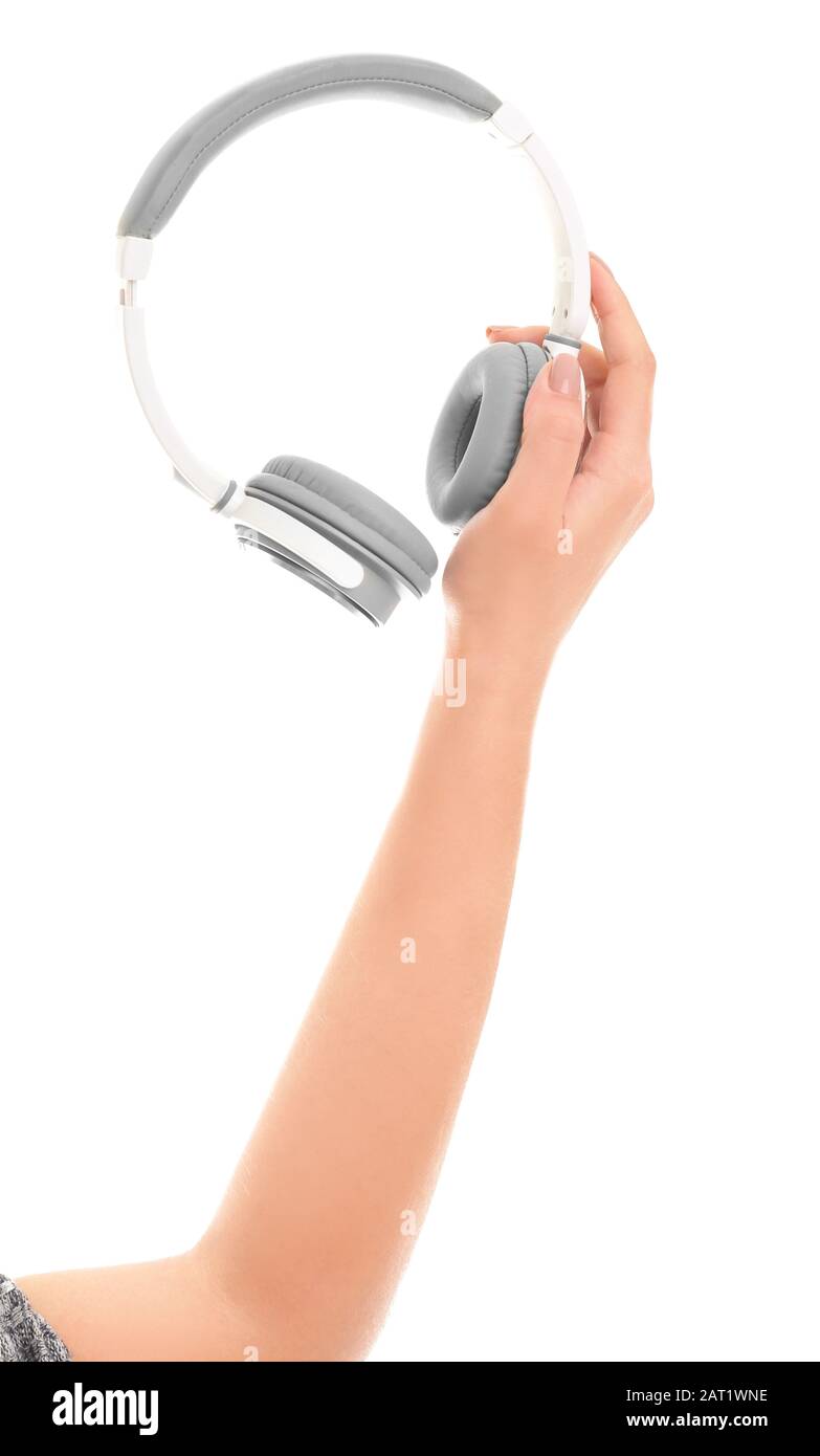 Hand with modern headphones on white background Stock Photo - Alamy