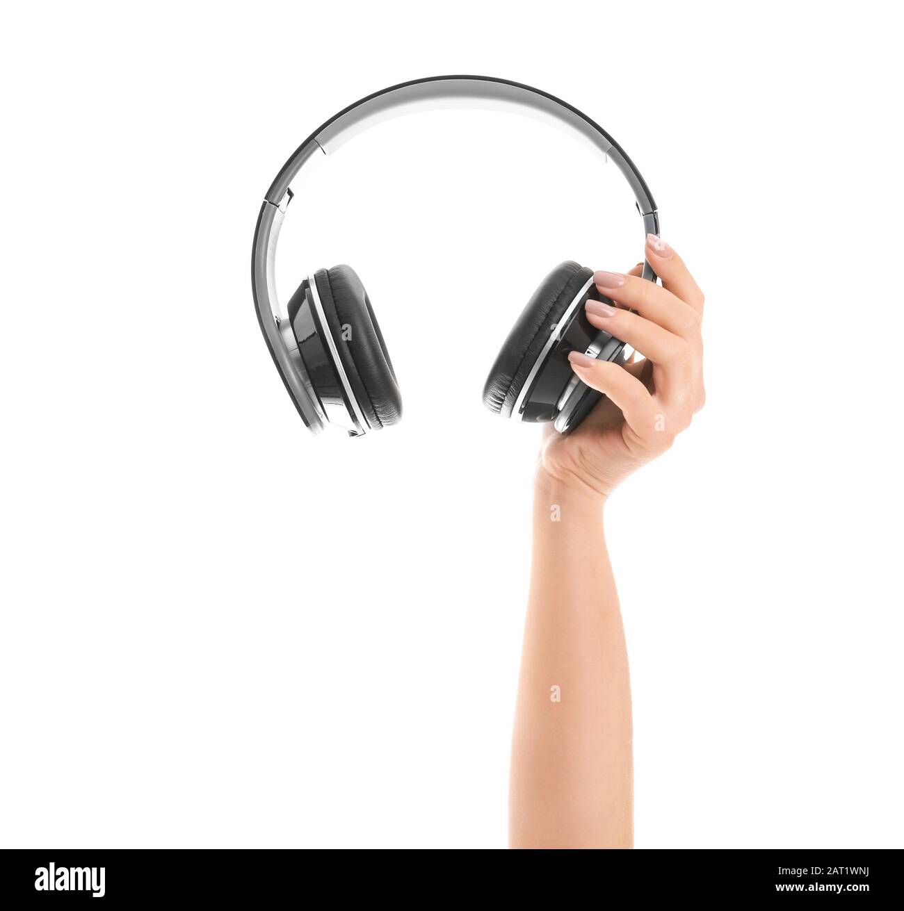 Hand with modern headphones on white background Stock Photo - Alamy