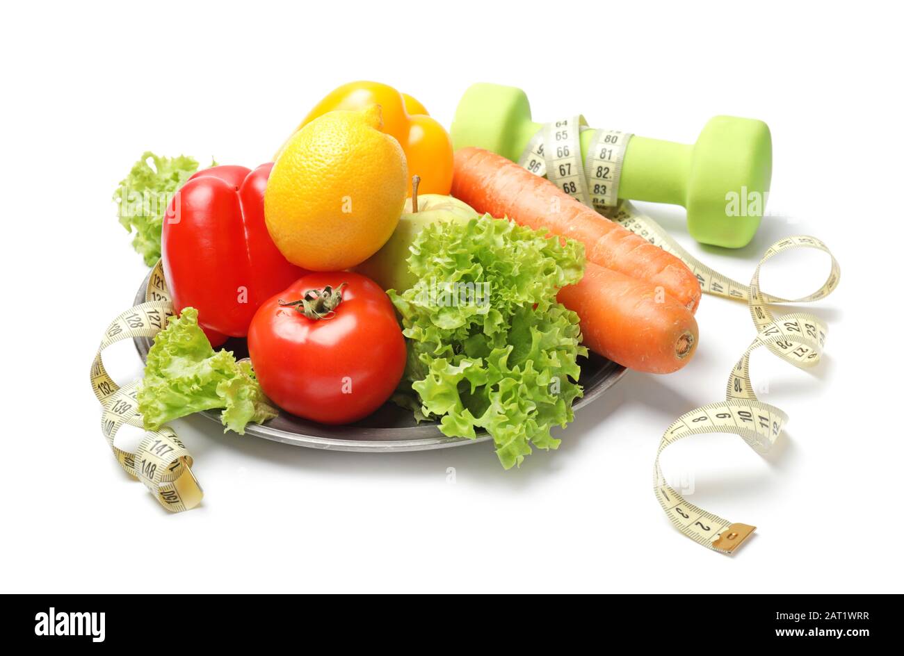 Different healthy food with measuring tape and dumbbells on white ...