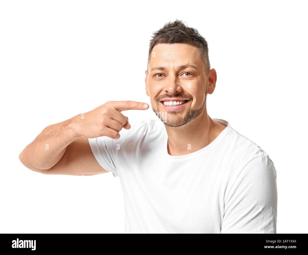 Dental care handsome man Cut Out Stock Images & Pictures - Alamy