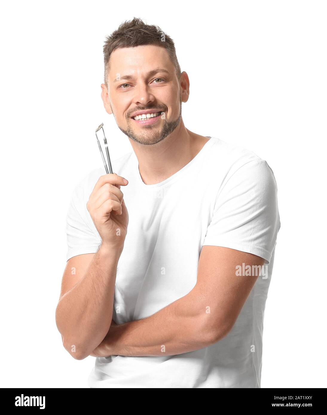 Dental care handsome man Cut Out Stock Images & Pictures - Alamy