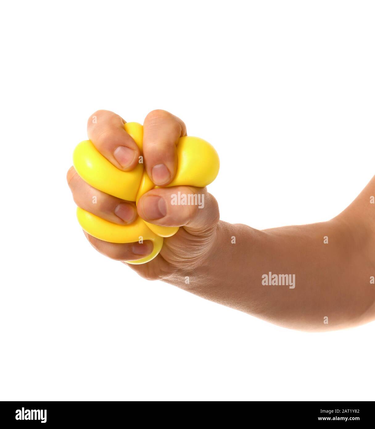 Hand squeezing stress ball on white background Stock Photo - Alamy