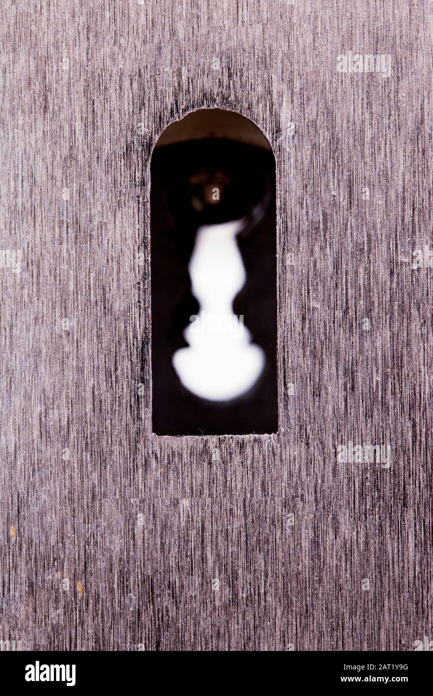Keyhole in oval shape. In metallic color Stock Photo - Alamy
