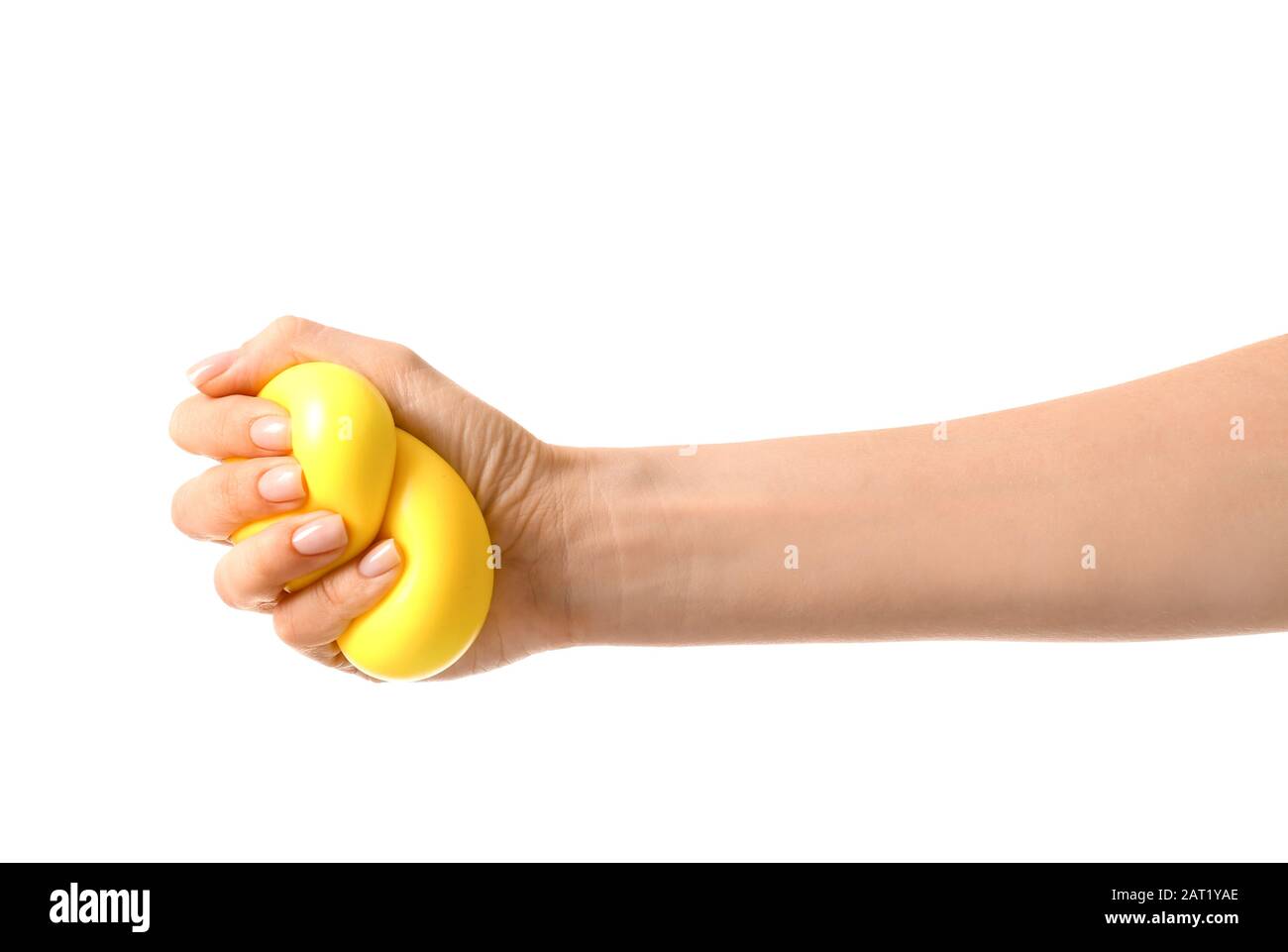 Hand squeezing stress ball on white background Stock Photo - Alamy