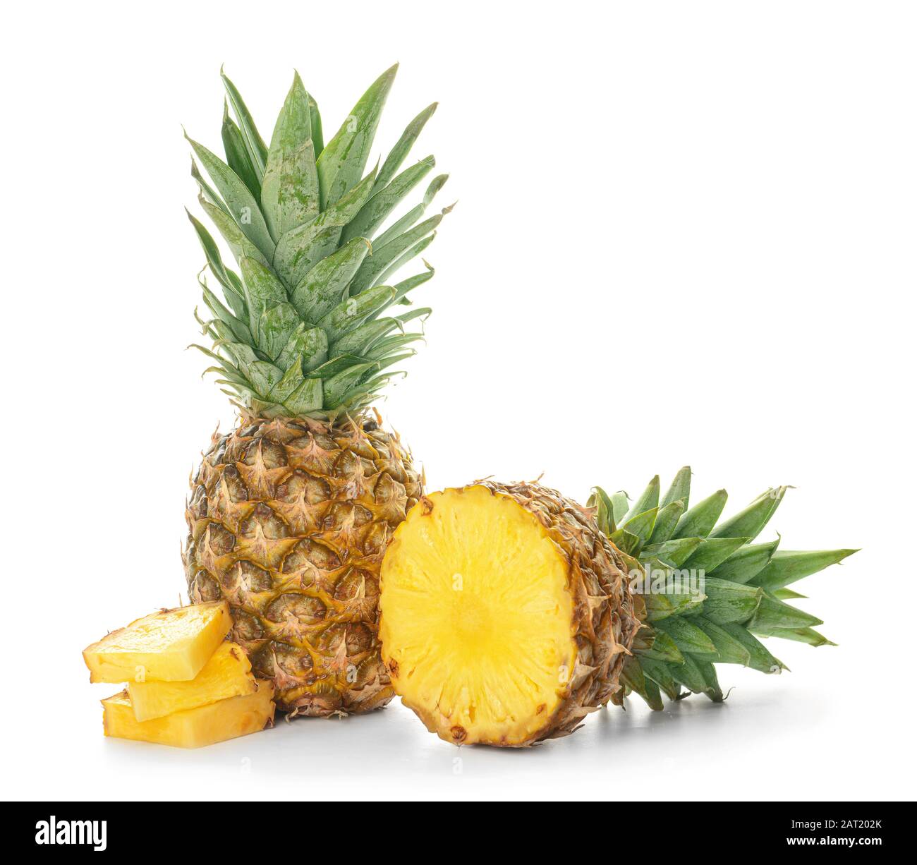 Fresh ripe pineapples on white background Stock Photo - Alamy