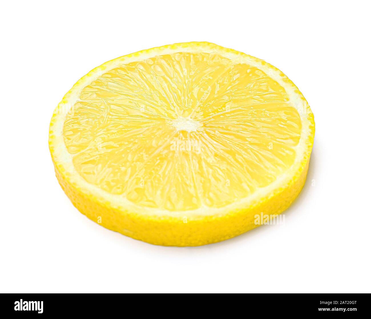 Slice of ripe lemon on white background Stock Photo - Alamy