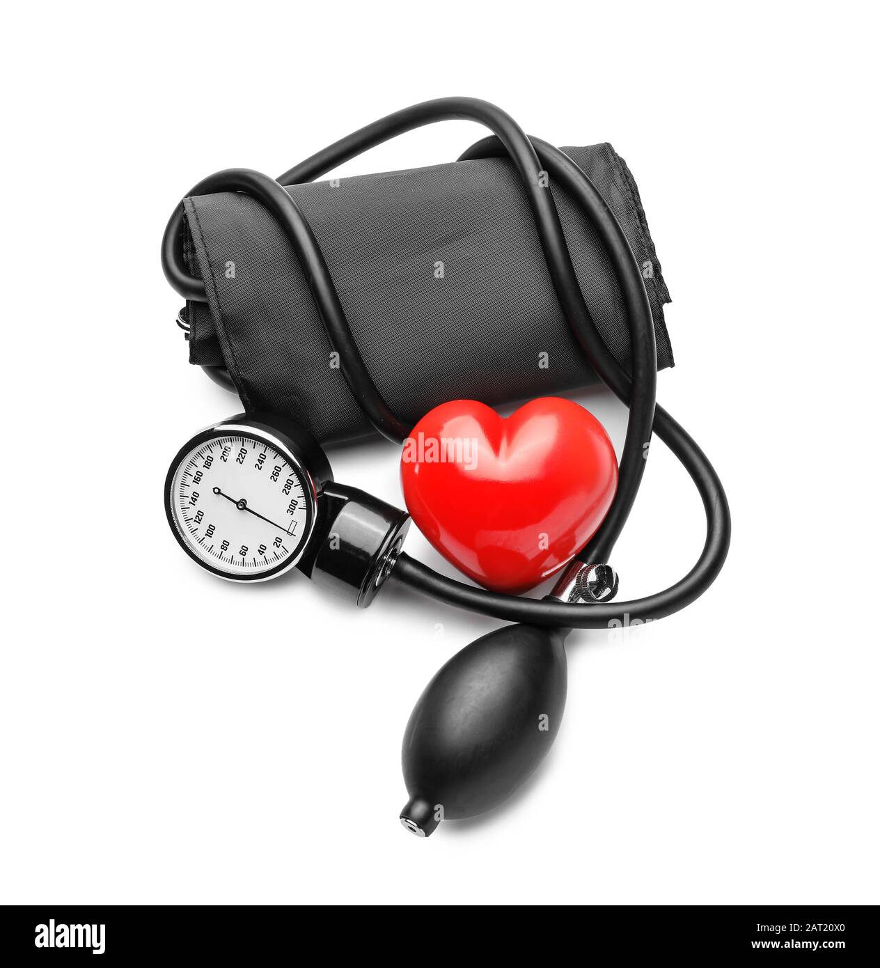 Sphygmomanometer with red heart on white background Stock Photo - Alamy