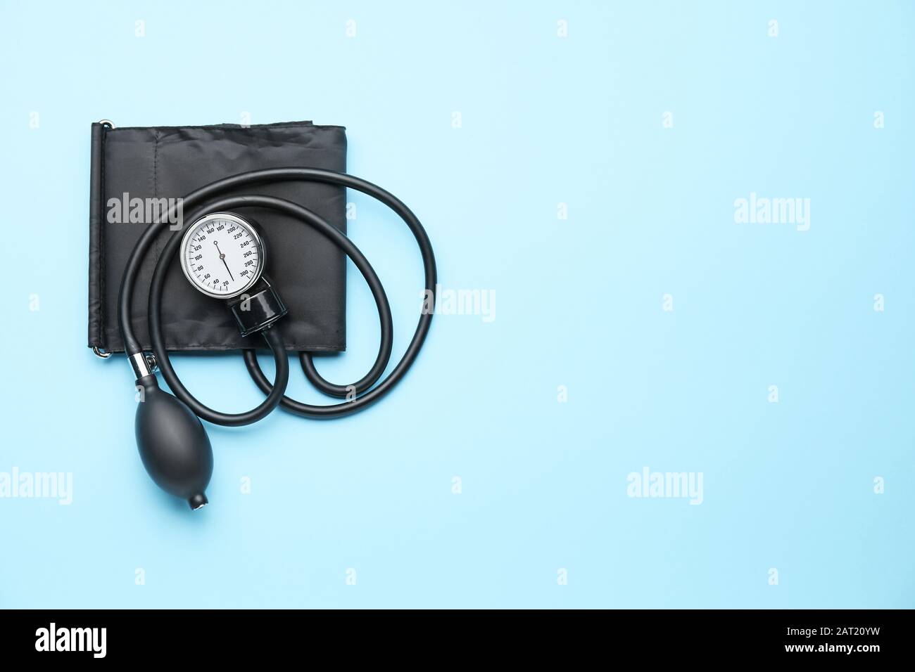 Modern sphygmomanometer on color background Stock Photo - Alamy