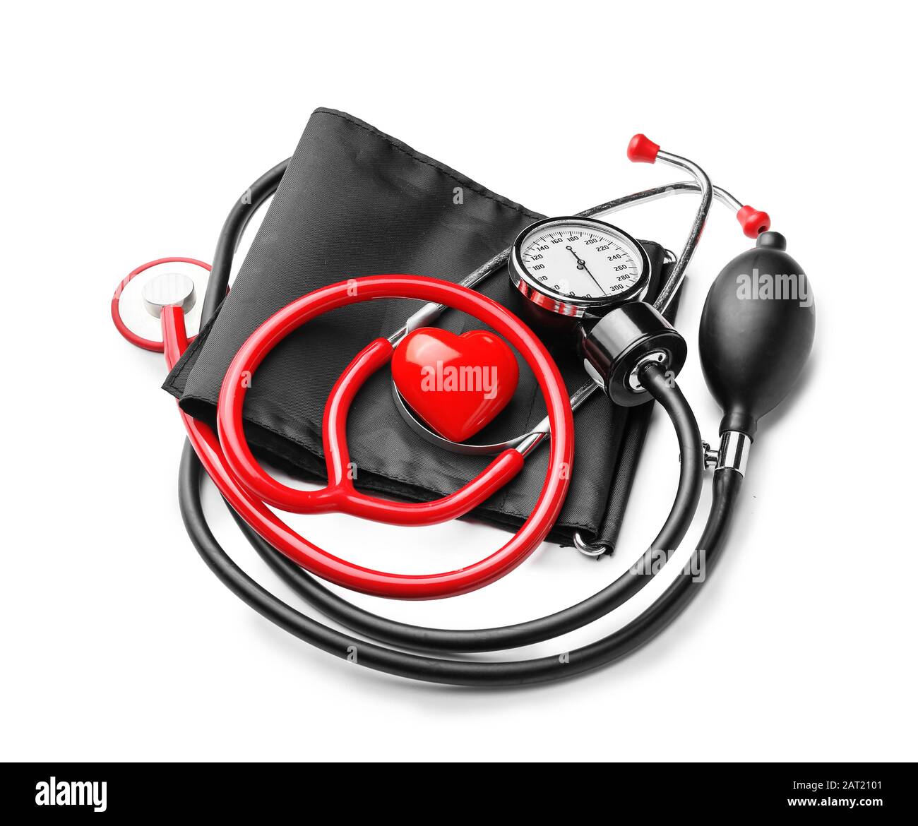 Sphygmomanometer with red heart on white background Stock Photo - Alamy