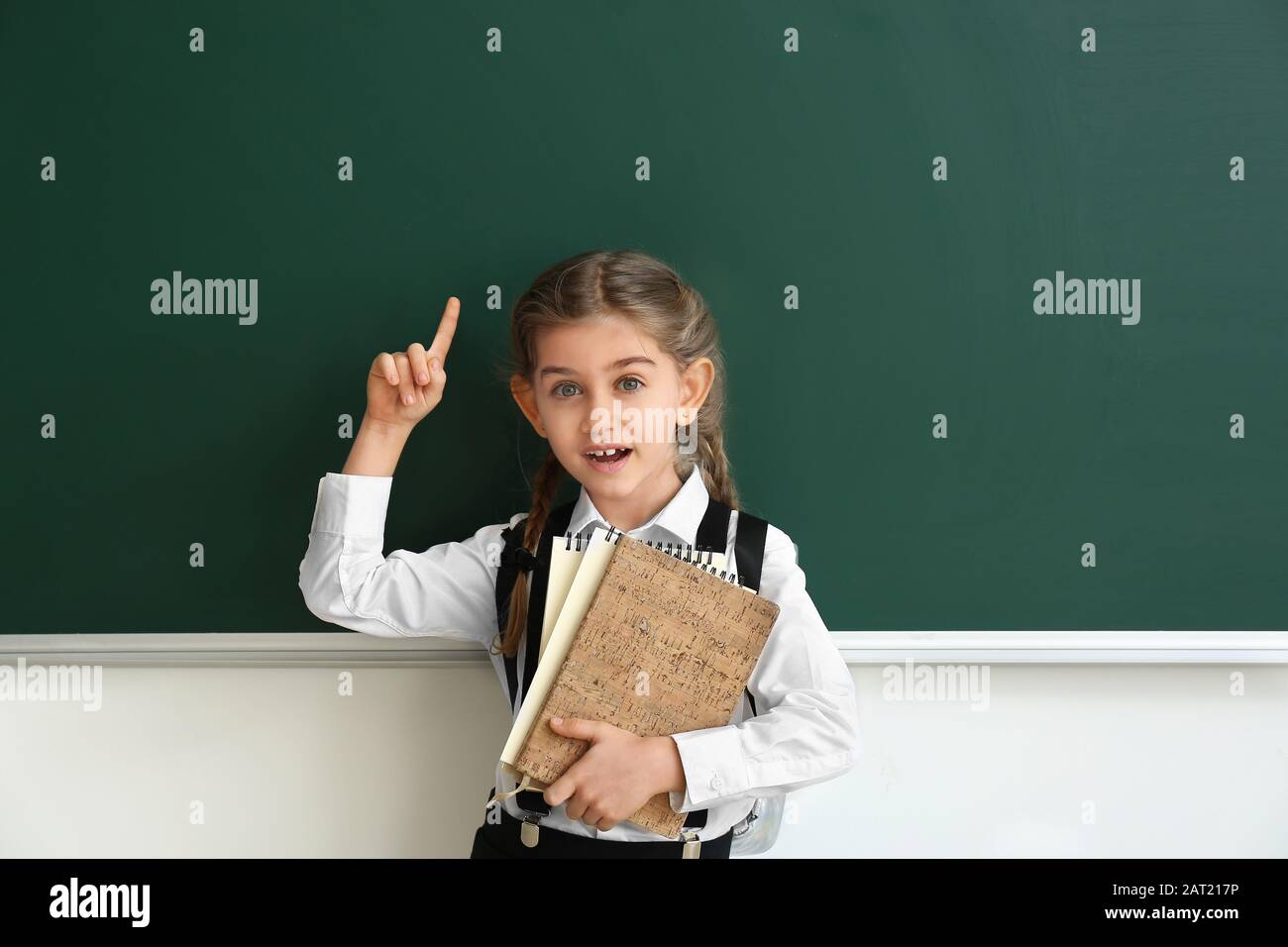 Raised finger classroom hi-res stock photography and images - Alamy