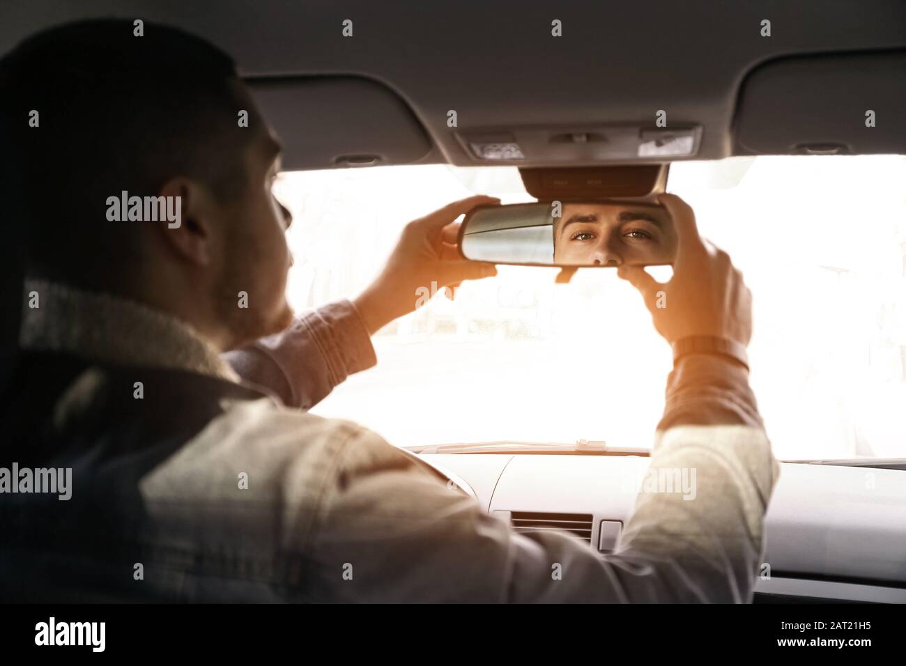 Adjusting the rear view mirror hi-res stock photography and images - Alamy
