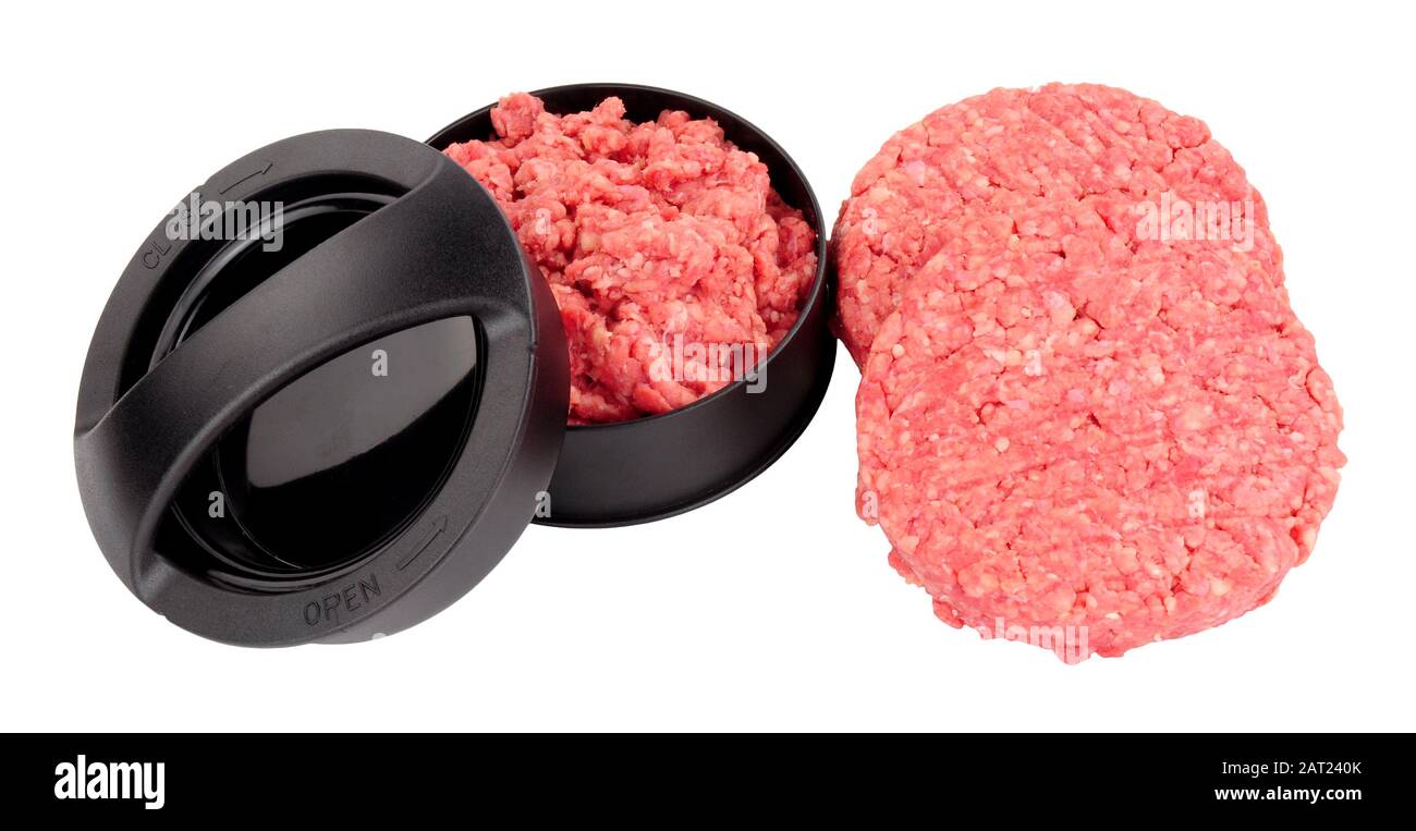 Burger press and freshly made burgers isolated on a white background ...
