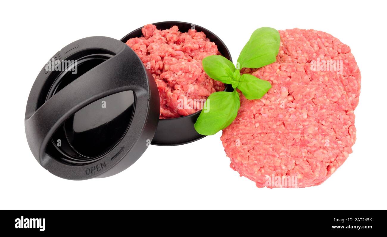 Burger press and freshly made burgers isolated on a white background ...