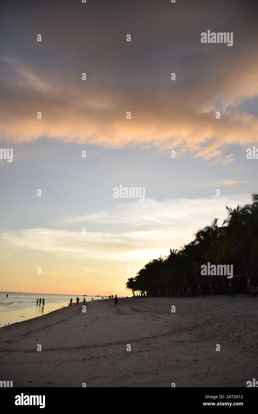 Sunset at the beautiful Dumaluan beach in Panglao island, Bohol ...