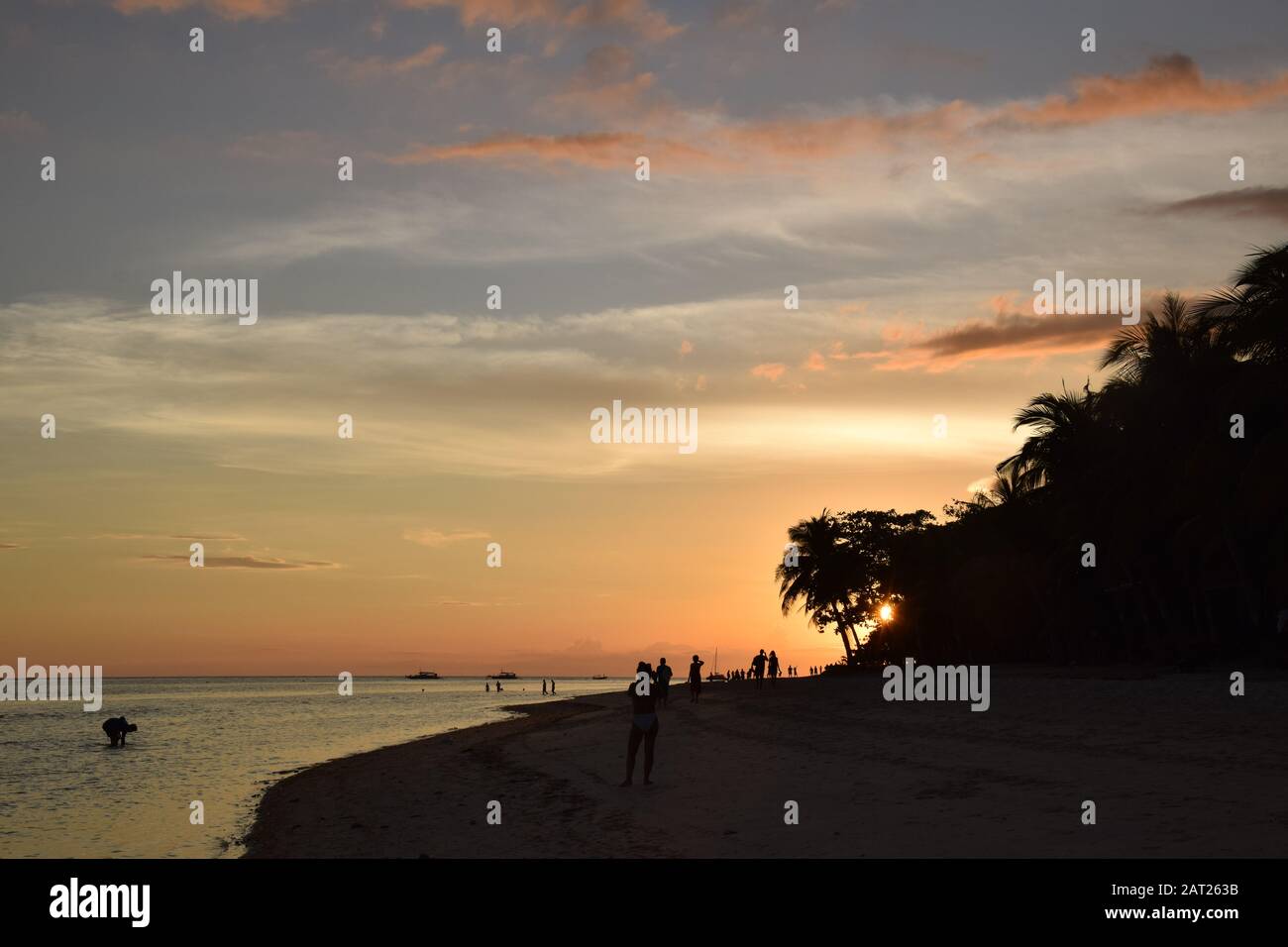 Sunset at the beautiful Dumaluan beach in Panglao island, Bohol ...