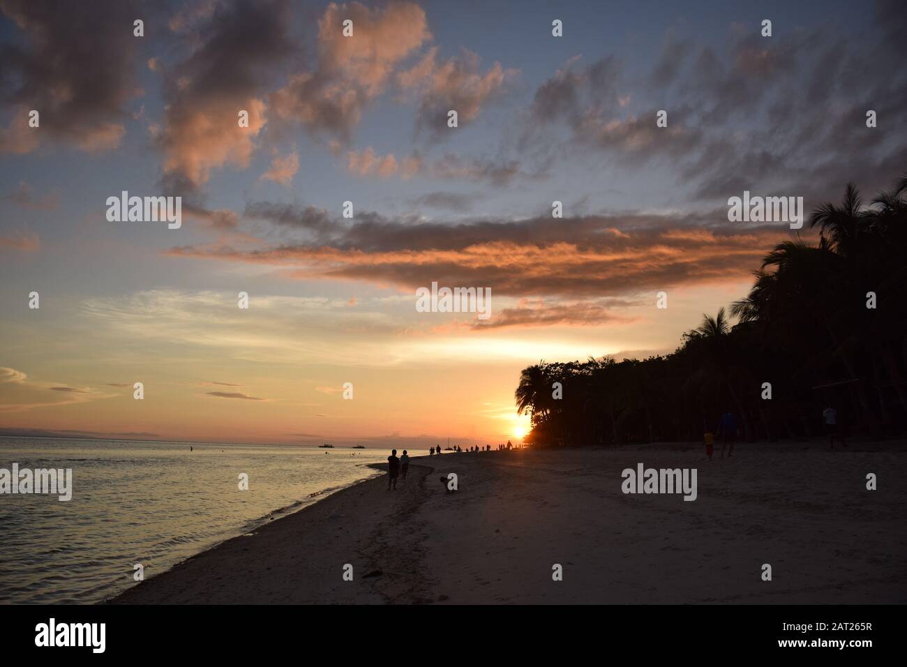 Sunset at the beautiful Dumaluan beach in Panglao island, Bohol ...