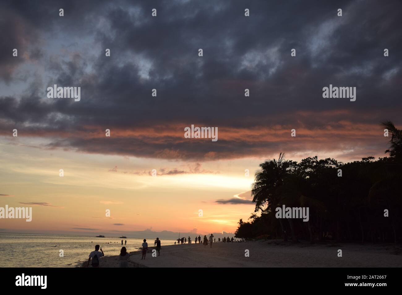 Sunset at the beautiful Dumaluan beach in Panglao island, Bohol ...