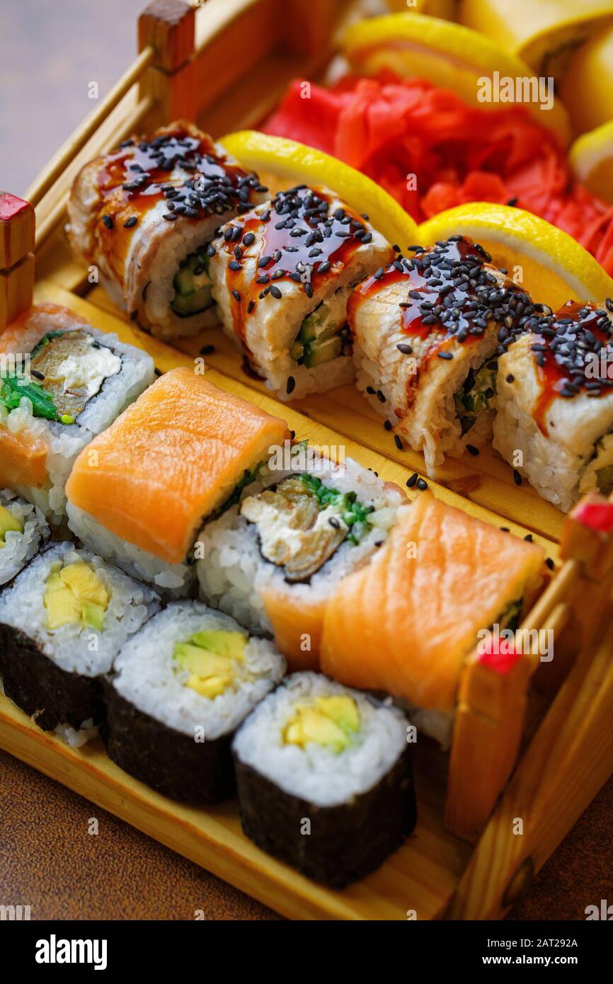 Set of sushi stuffed with fish, vegetables and cheese Philadelphia ...