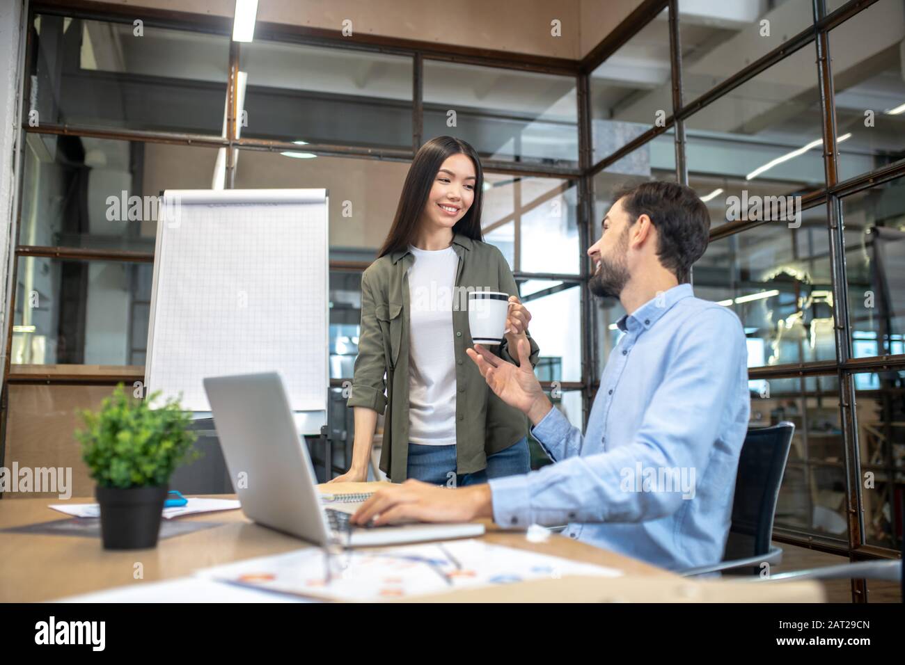 Office manager giving new project hi-res stock photography and images ...