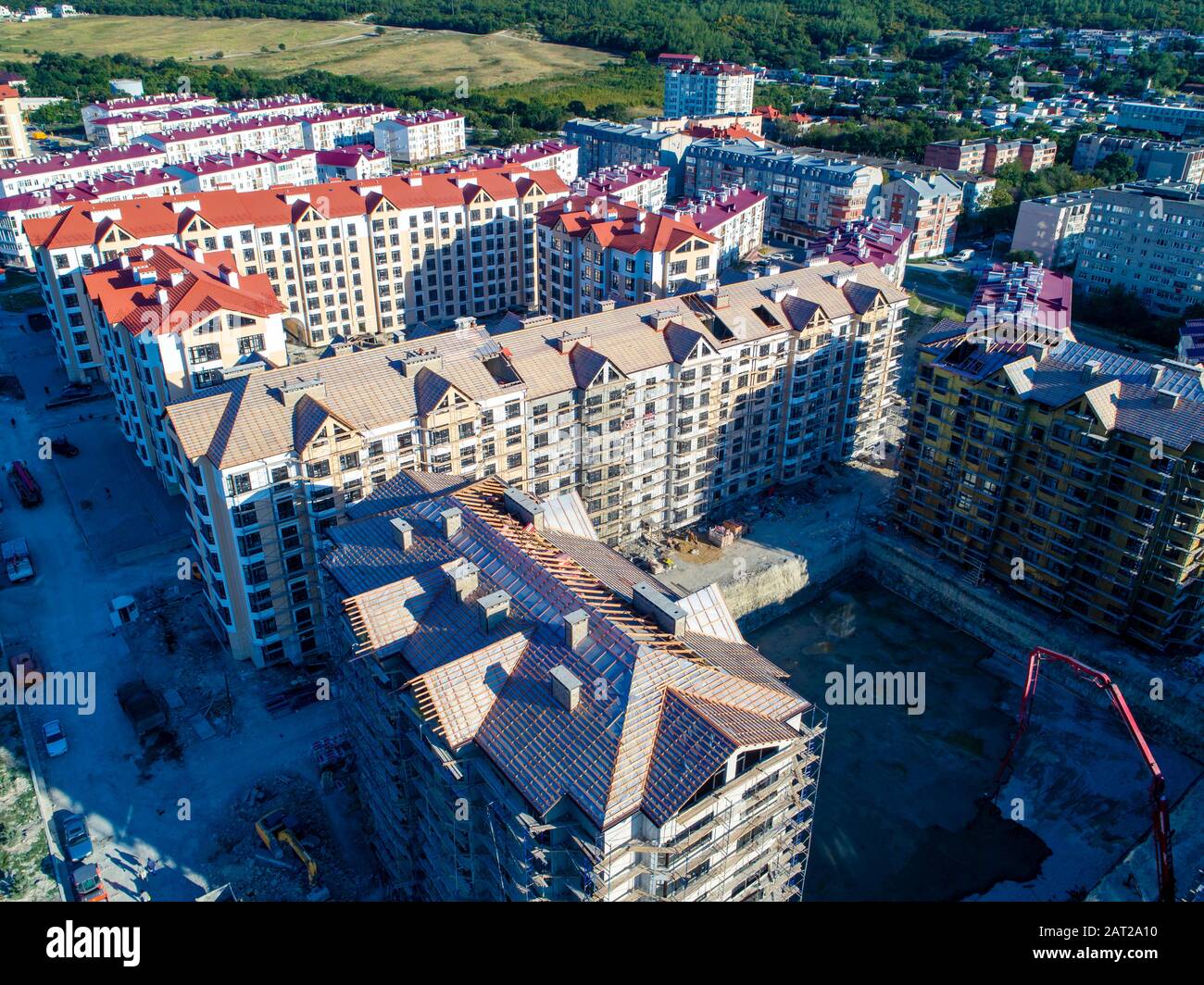 Construction of a residential neighborhood. Several buildings of the ...