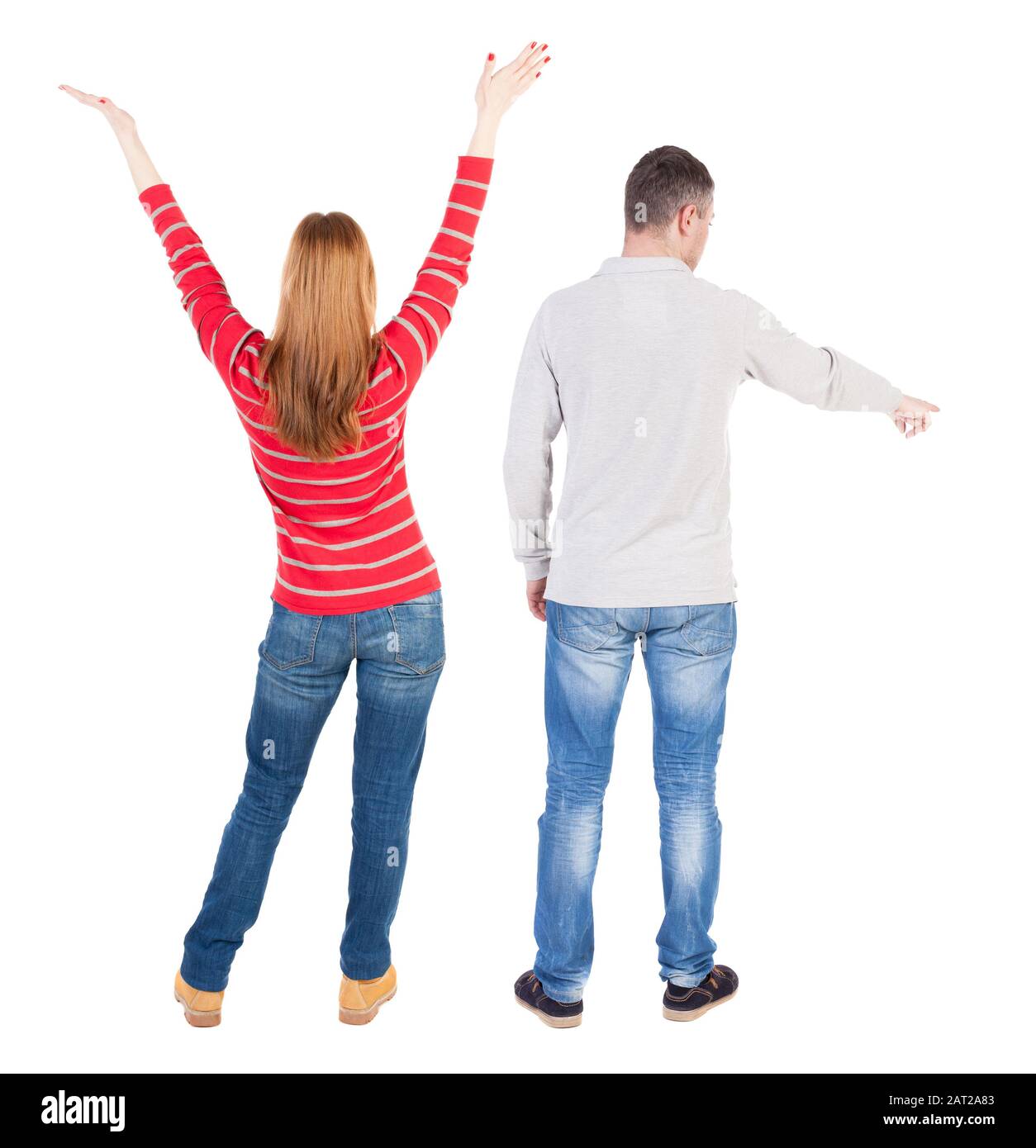 Back view of couple couple in sweater pointing. beautiful friendly girl ...