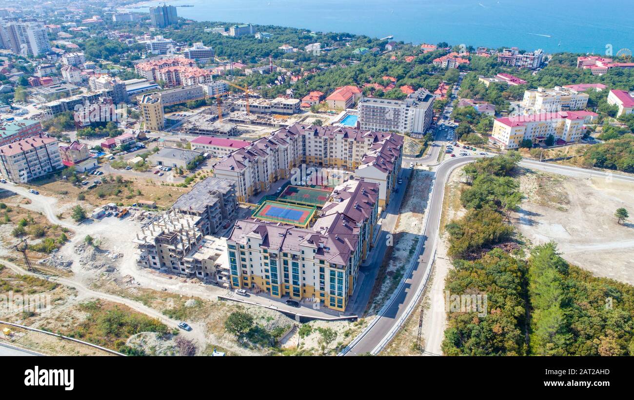 Construction of a residential neighborhood. Several buildings of the ...