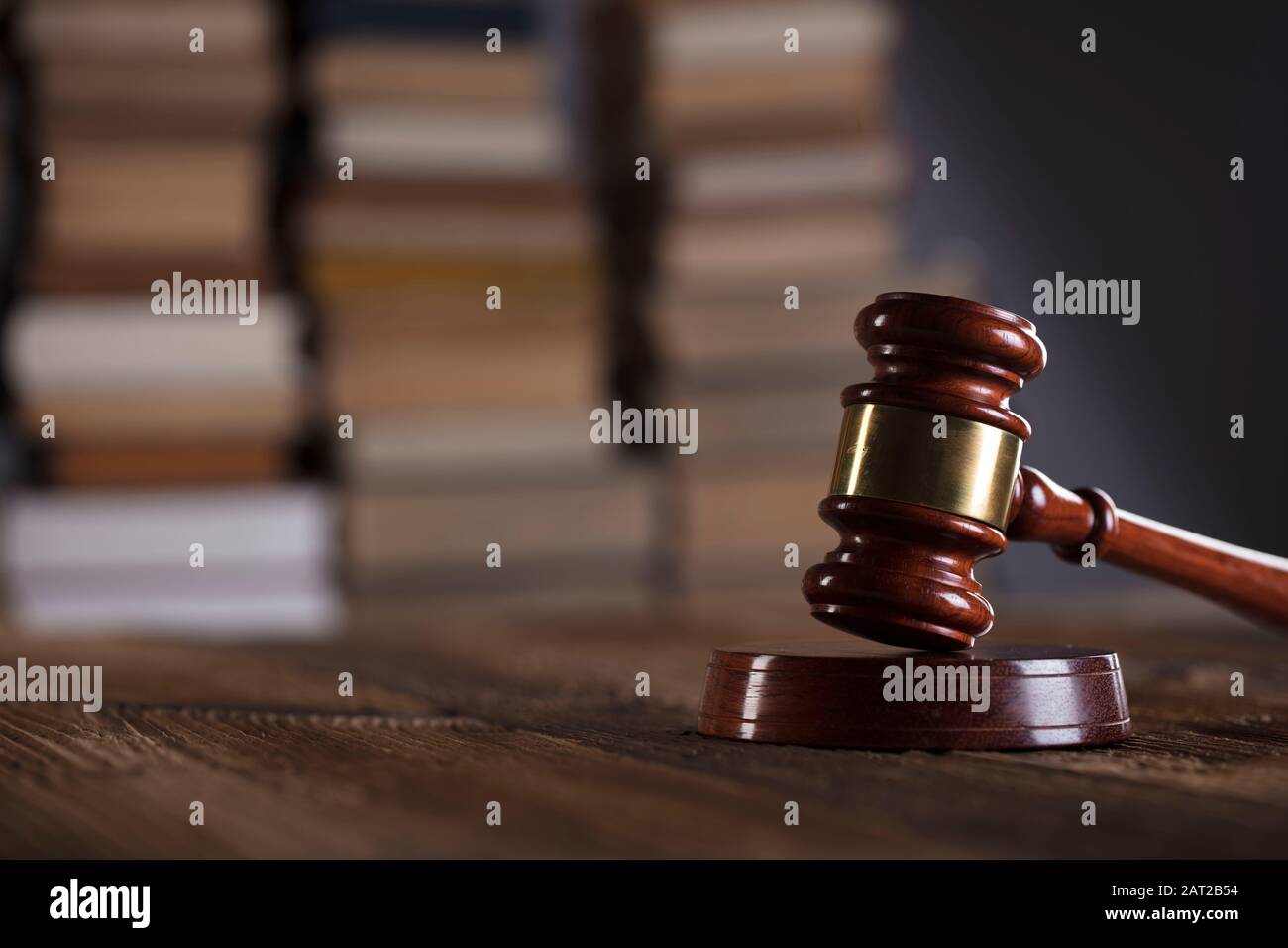 Law theme. Themis statue, gavel scale and legal books on rustic wooden ...