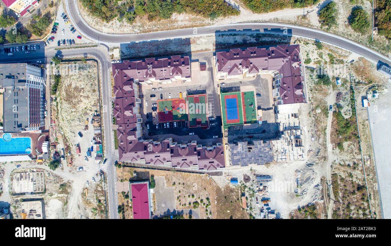 Construction of a residential neighborhood. Several buildings of the ...